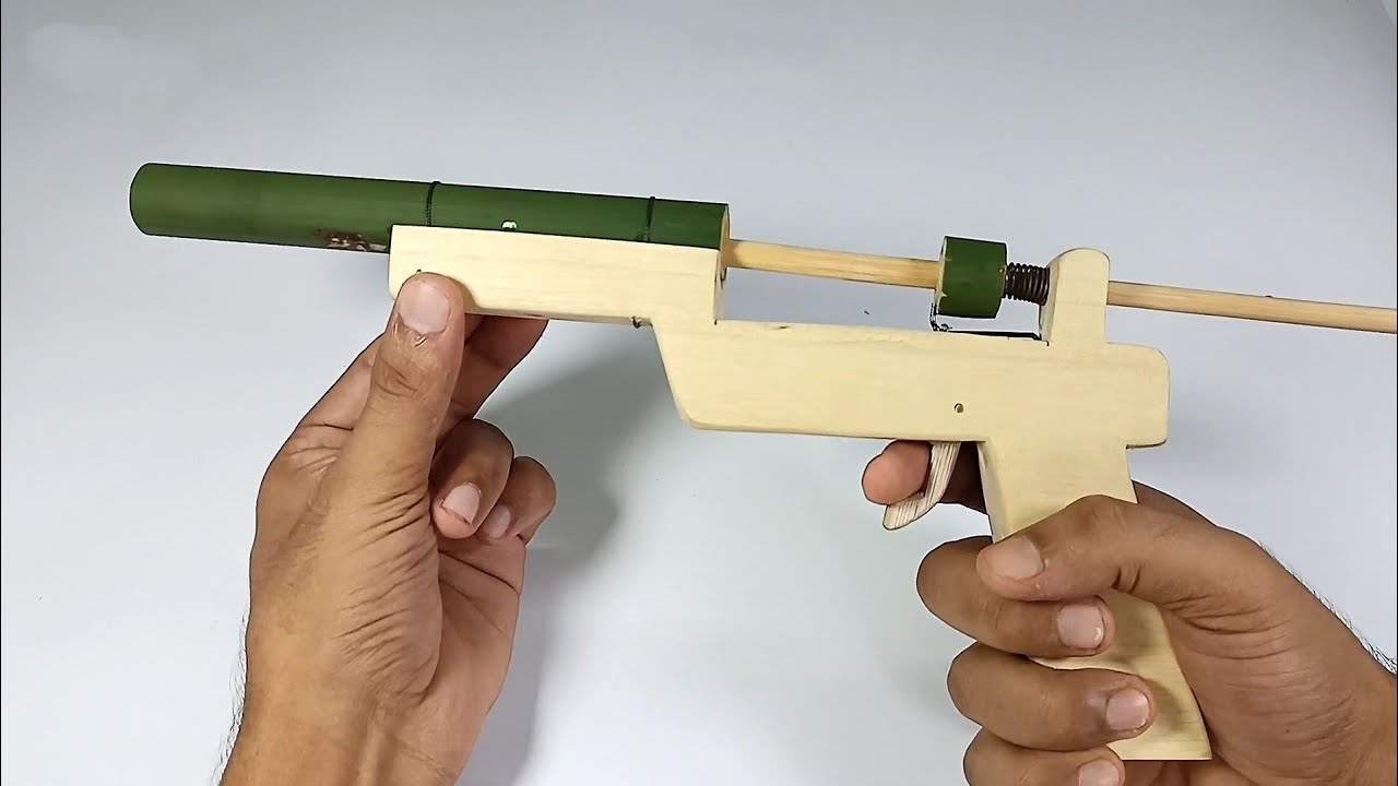 How to make a simple gun-style slingshot with a unique trigger | DIY ...