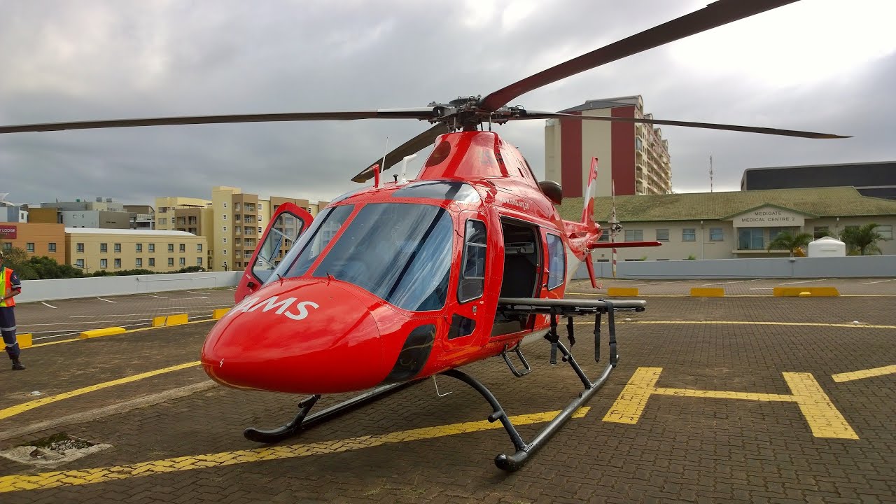 Red Cross AMS Agusta 119Ke Landing Roadside - YouTube
