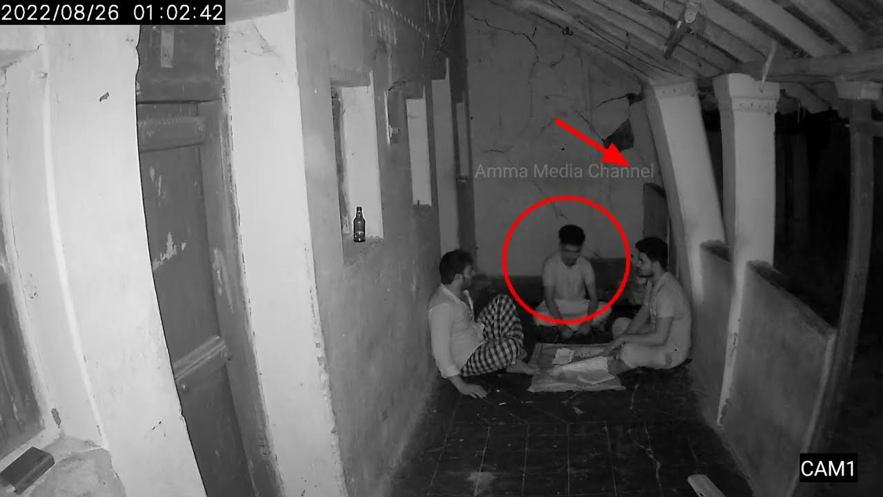 CCTV footage of a real ghost chasing two men playing cards in the middle of the night - YouTube