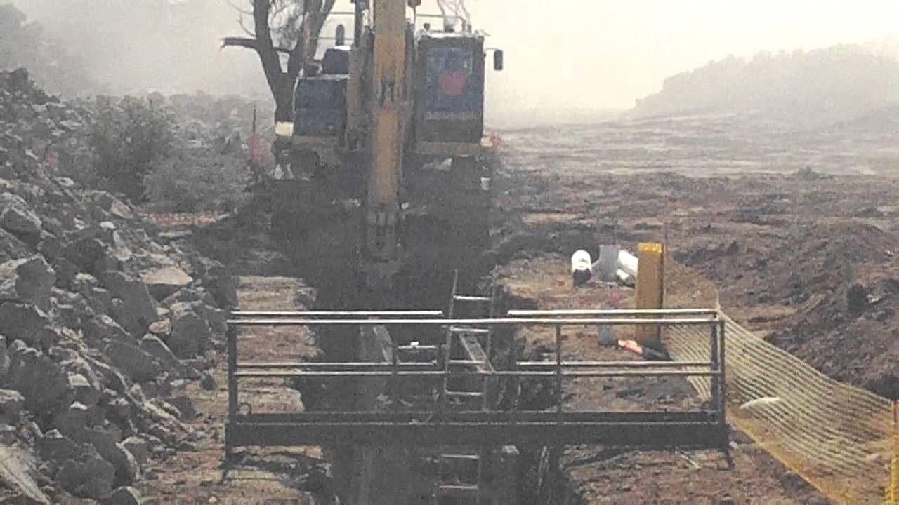 46t excavator rock trenching - YouTube