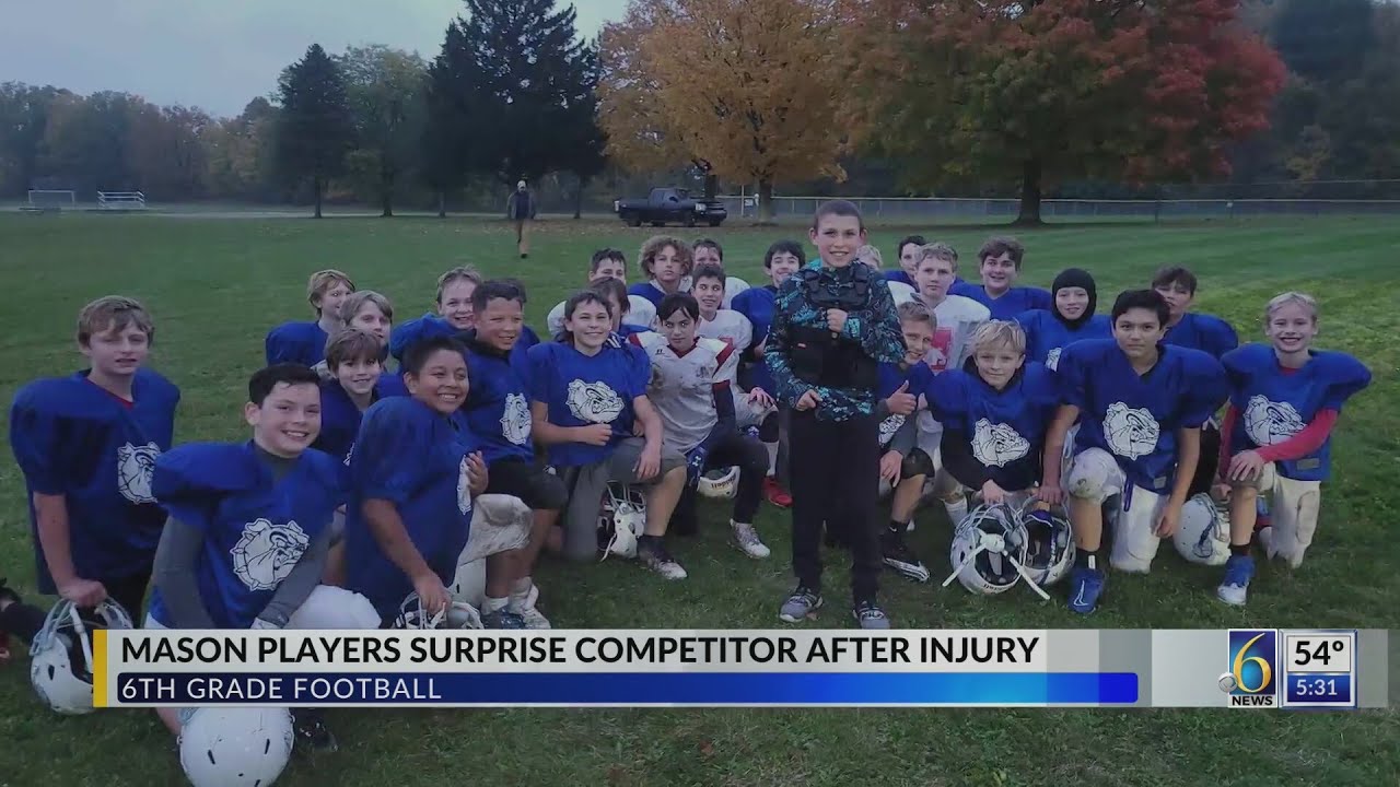 Mason football players rally to support injured opponent - YouTube