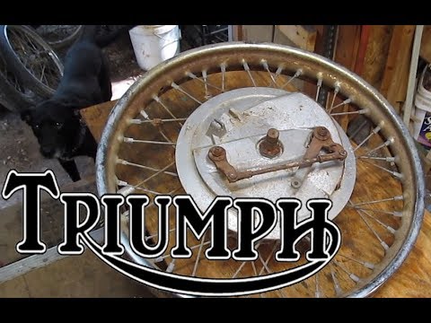 How to disassemble Triumph TLS Front Wheel and BONUS Parts Haul - YouTube