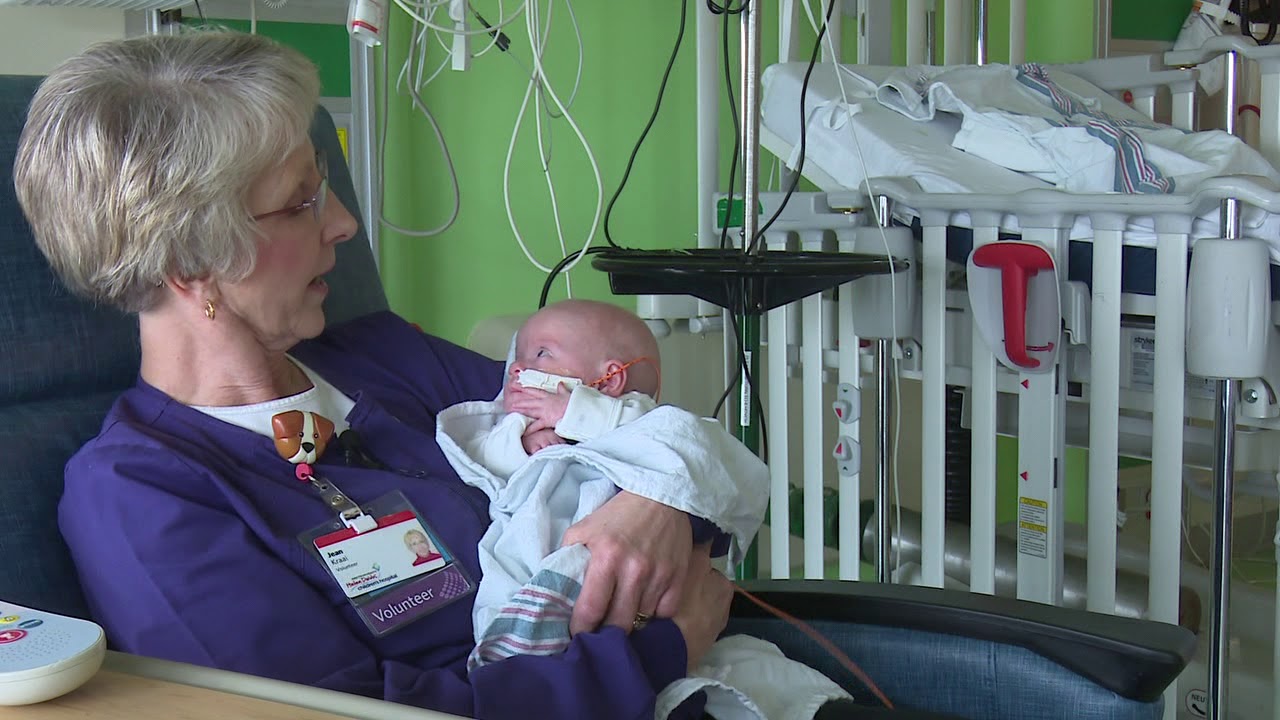 Greatest Job Ever!!! Volunteers cuddle babies at hospital - YouTube