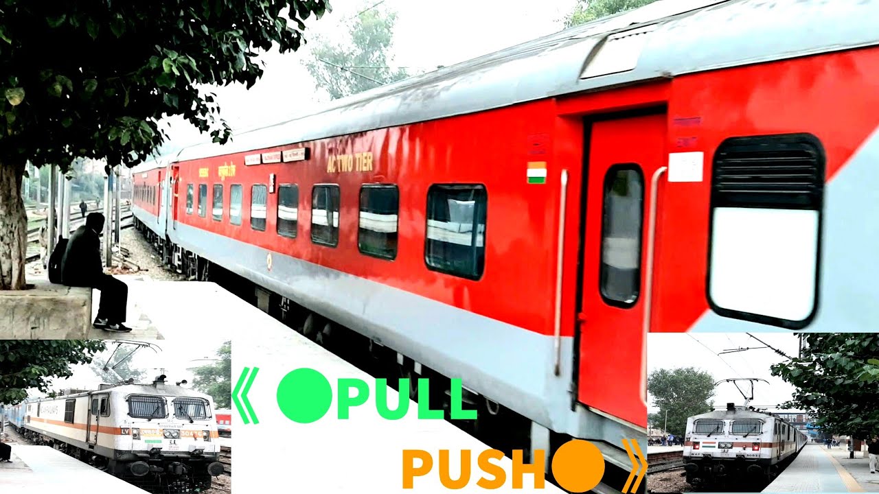 Mumbai Rajdhani departs with Push-Pull WAP7 between Two incoming Trains ...