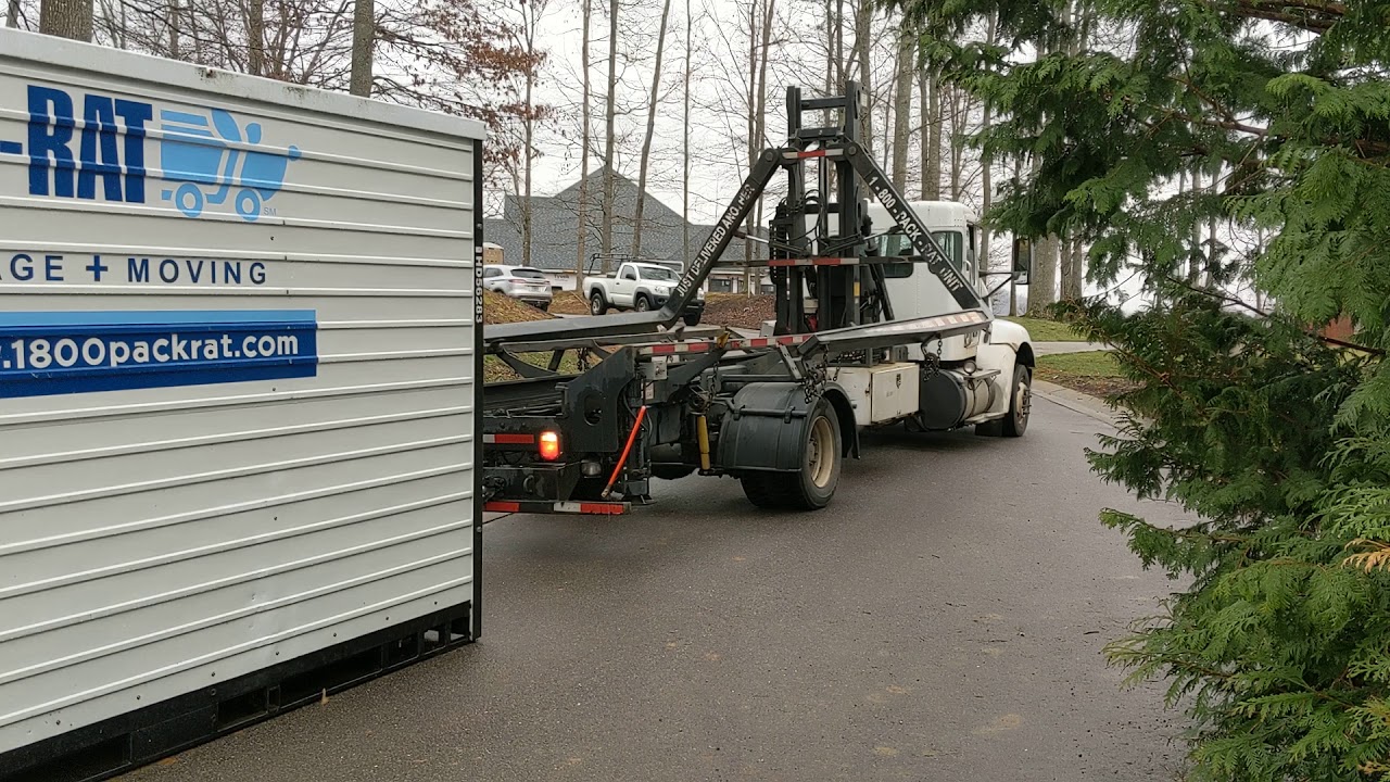 Asheville Movers Unloading 1-800-PACK-RAT Loading Portable Storage ...