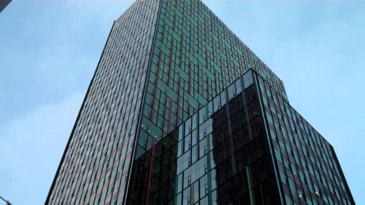 1bicycleddie rdiing in Seattle, angular buildings, Modernist glass and ...