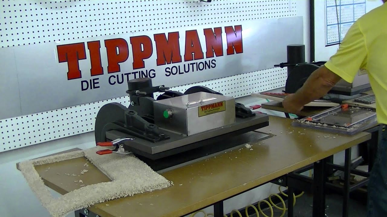 Die cutting machine cutting carpet. Die cutting press demonstration ...