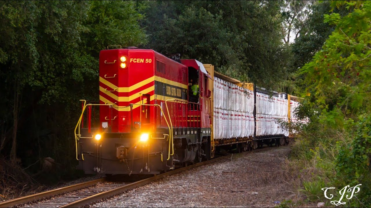 Florida Central Railroad CF7 #50 pulls a local in Orlando - YouTube