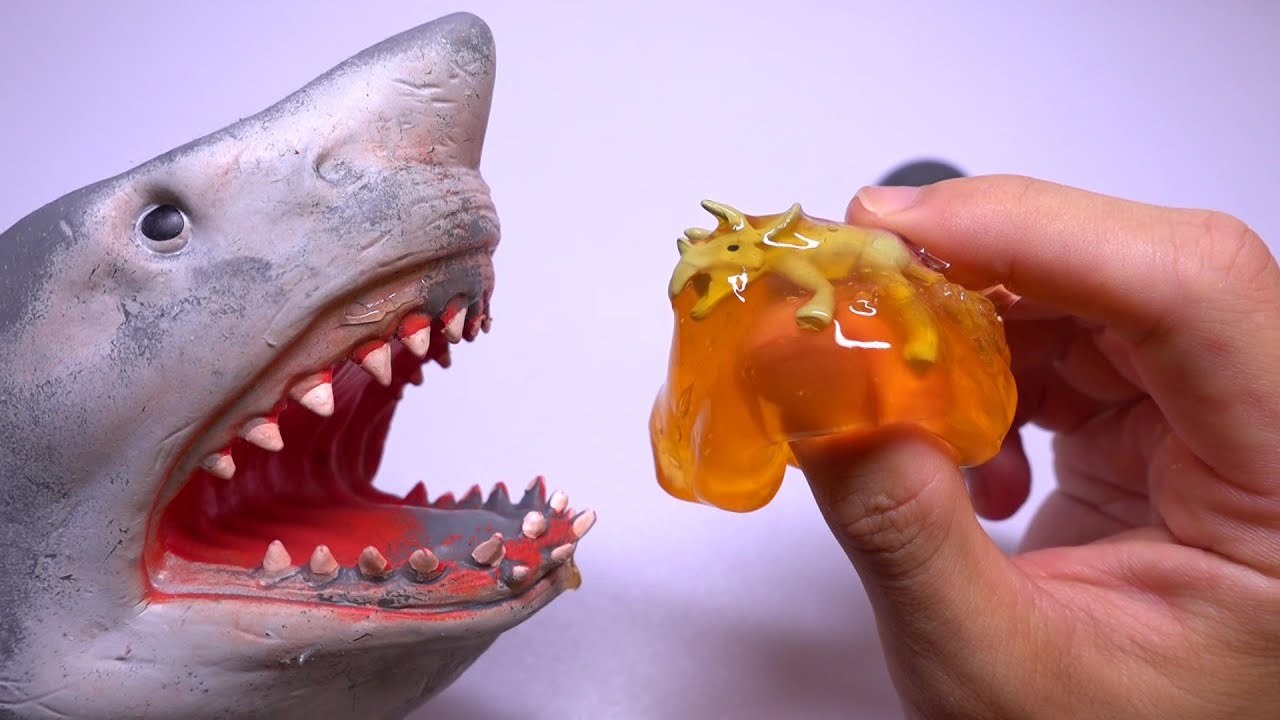Shark puppet plays with newborn Triceratops | slime dinosaur eggs ...