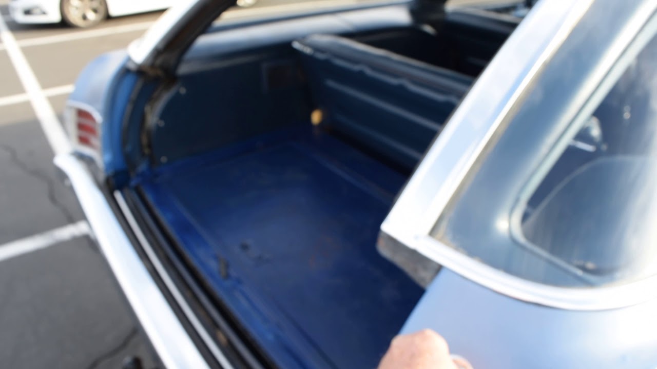 station wagon clamshell door operation - YouTube