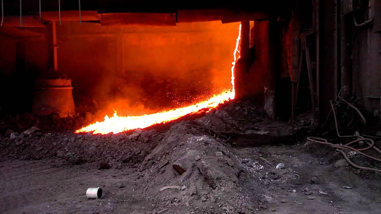 Molten steel pouring flowing & spitting like lava - YouTube