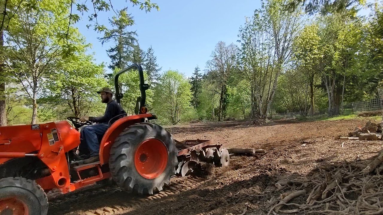 Family of Four Turns Forest Into Farm | Plowing and Discing a New Field ...