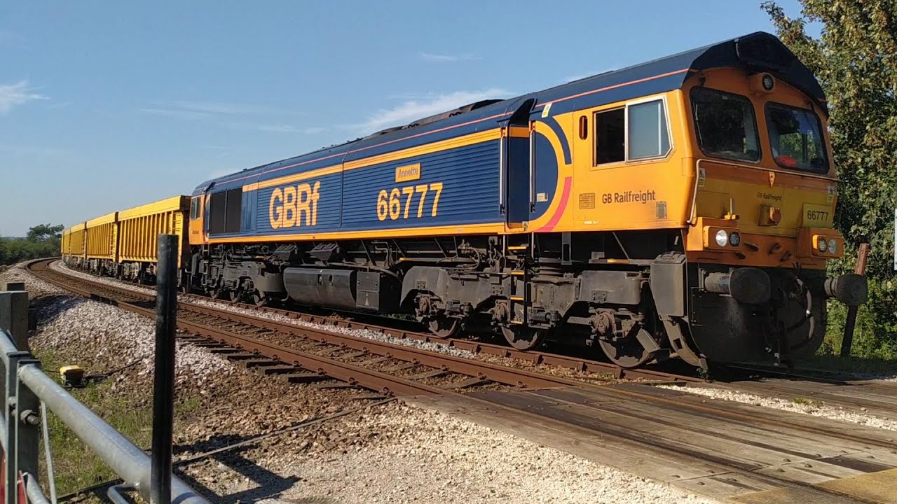 GBRf Class 66 - 66777 "Annette" Network Rail ballast train passing ...