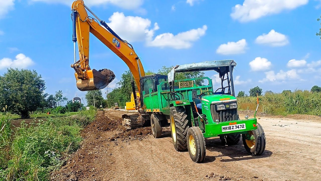 Traktar loading with cat Excavator 🫣| poclain se tracktar loading ...