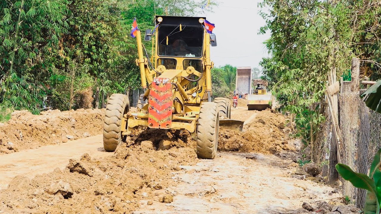 Filling the Clay for the Village Road Foundation with a Dump Truck, a ...