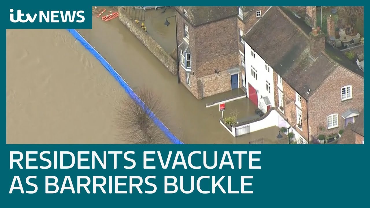 Emergency evacuation as flood barriers overwhelmed | ITV News - YouTube