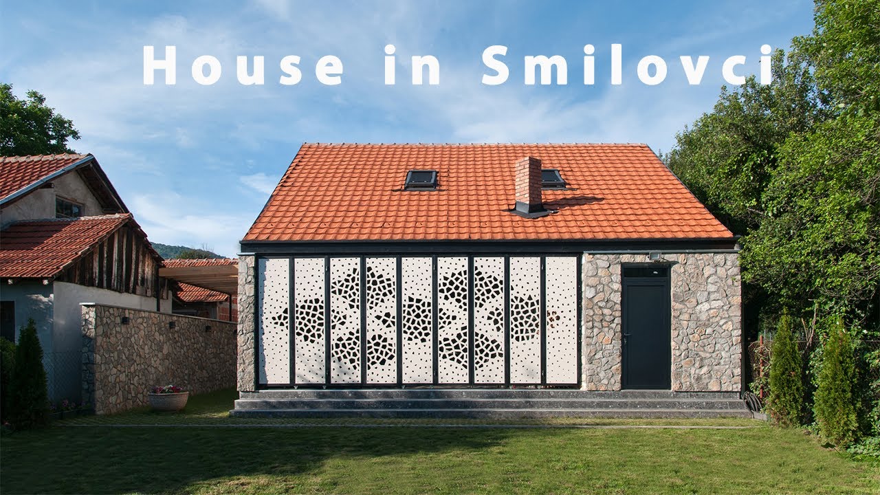 house is divided into ground floor (containing living room, kitchen ...