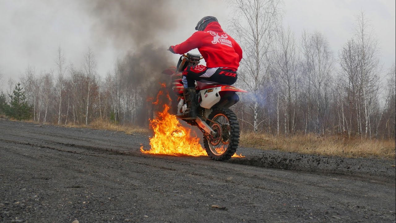 Idiot Drives Through Fire on Dirt Bike - YouTube