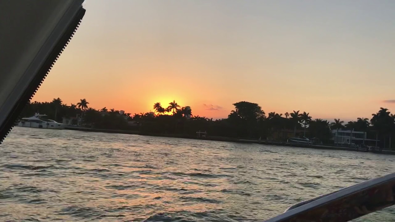 Boat rides through the sunset - YouTube