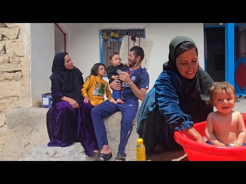A trip to the village: The Atabak family returns to the village to harvest the farm's crops.