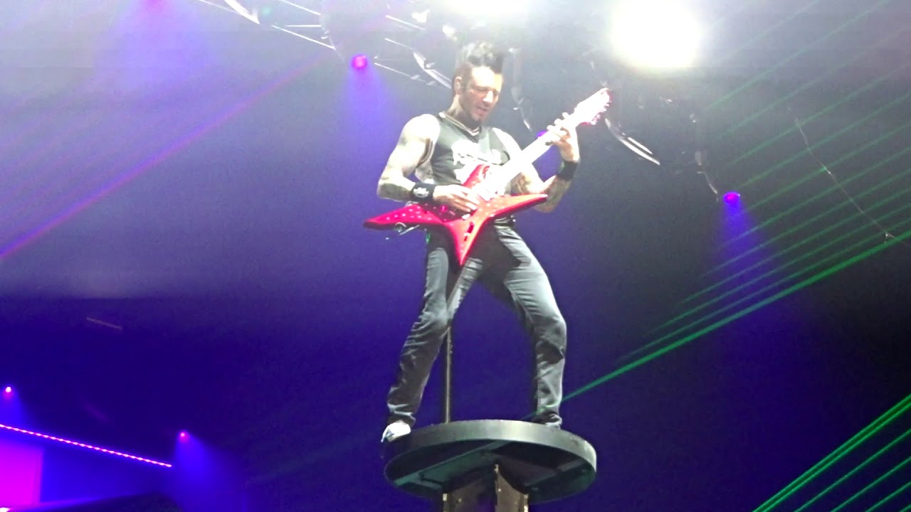 Jason Hook of 5FDP guitar solo high above the stage during 'Coming Down ...