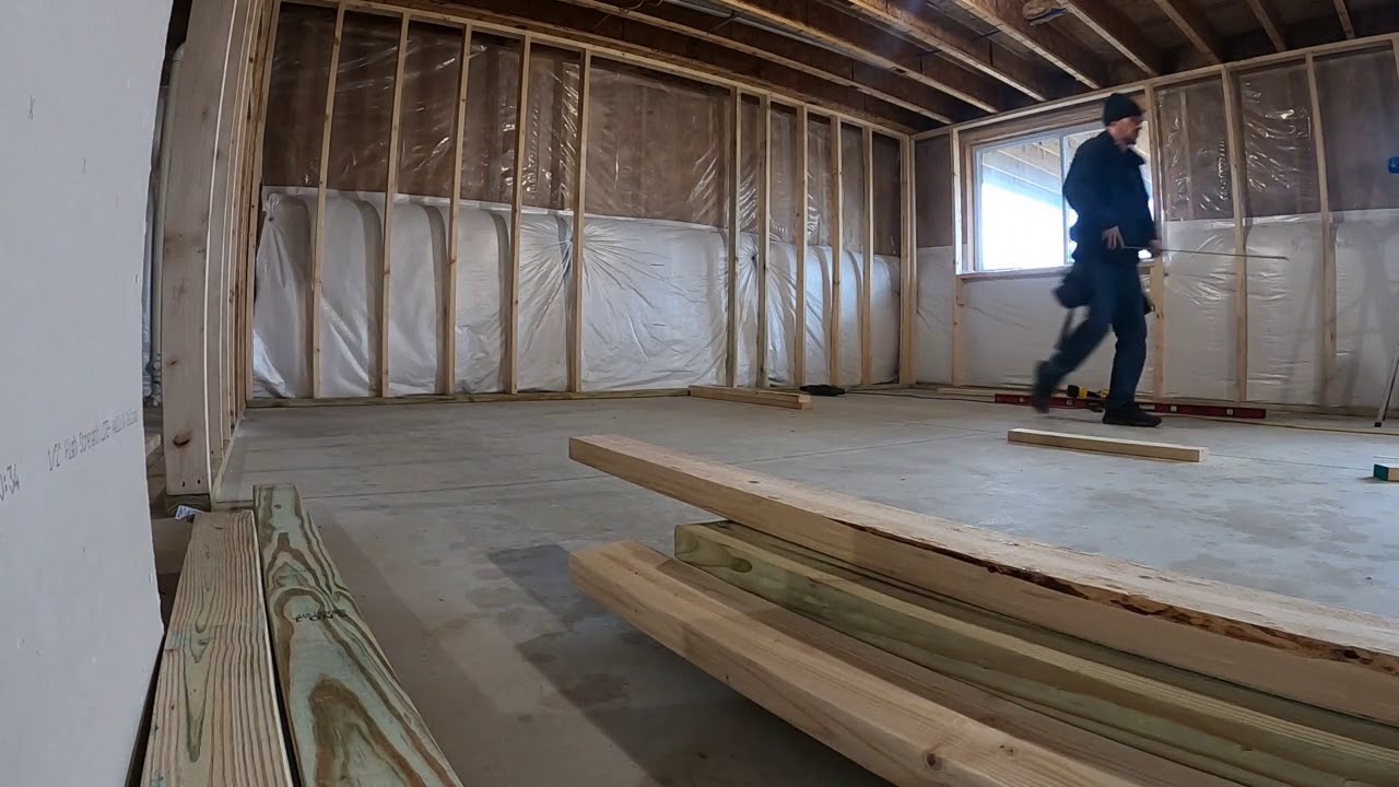 More framing of the basement finish job - YouTube