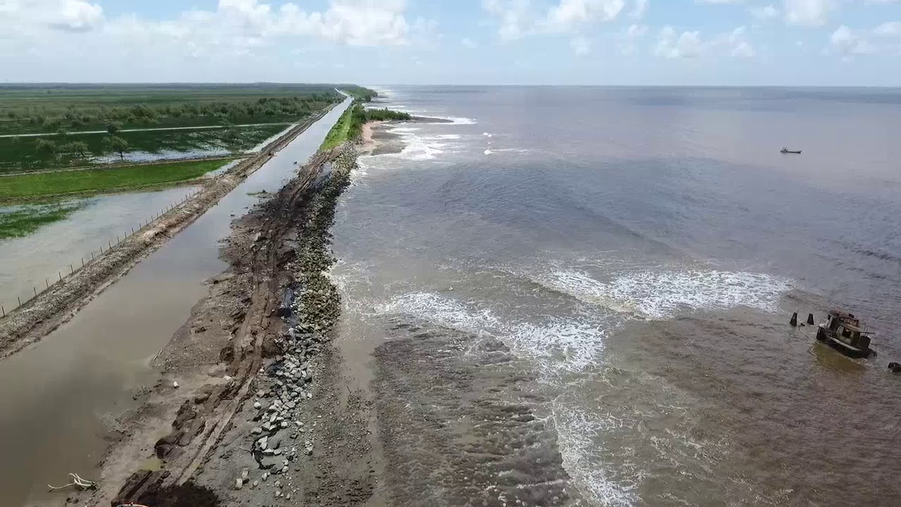 Aerial view of the sealed sea breaches - YouTube