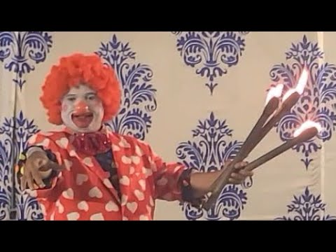 Comedy Fire Juggling of Dum Dum Funny clown - YouTube