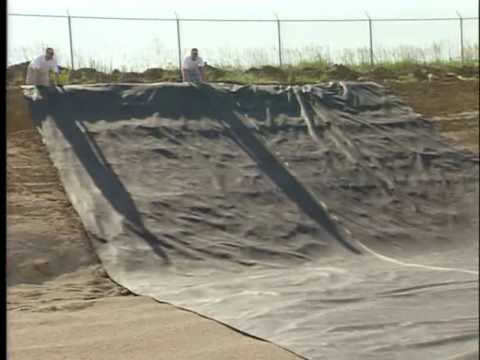 Install geotextile - down hill.avi - YouTube