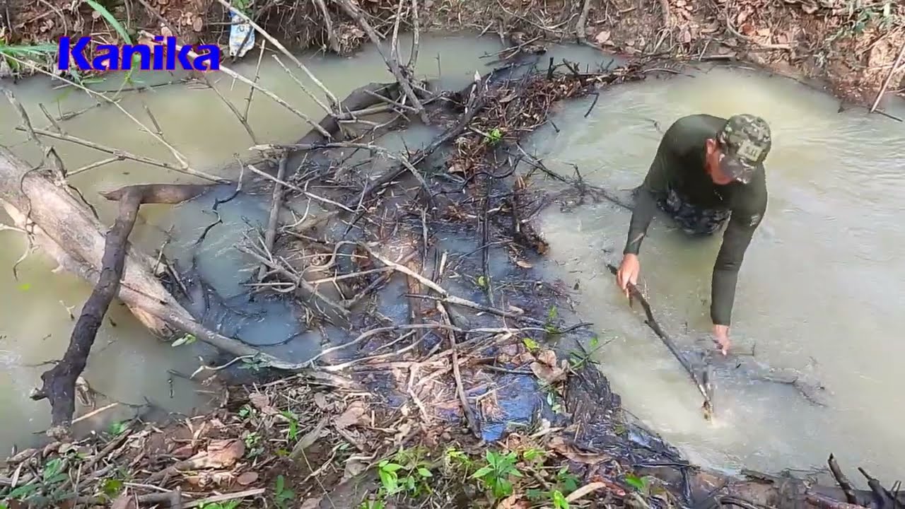 Removing Woods And Debris Clogged Canal Drain - YouTube