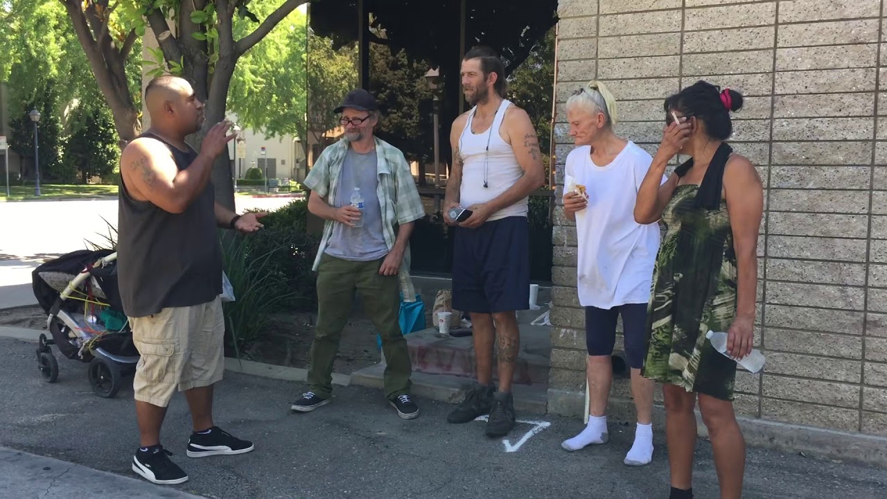 Giving Water to the homeless - YouTube