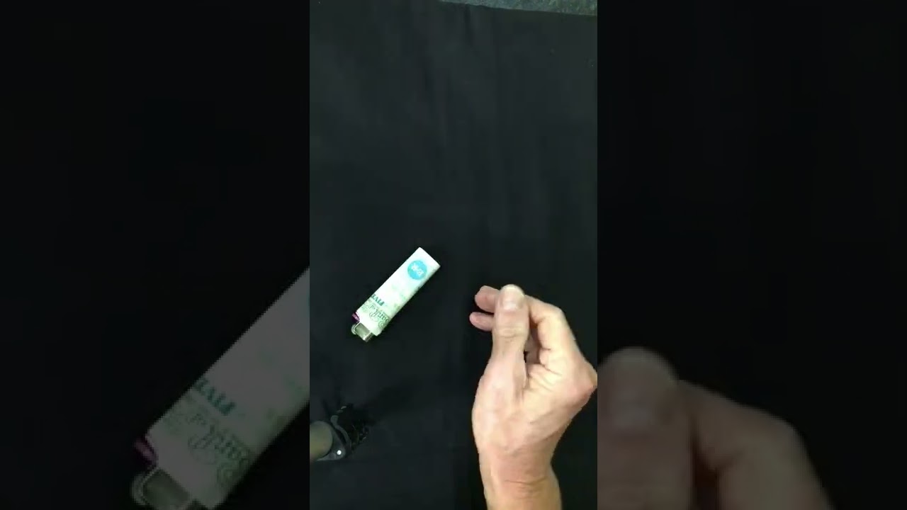 BIC magic transparent lighter magic trick! Make money appear through a ...