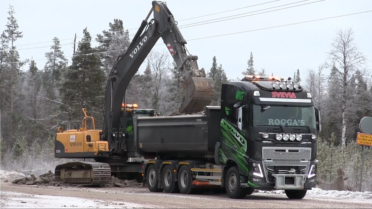 Volvo EC210C loading Volvo FH16 Gen4 750hp 8x4*4 with rock / gravel ...