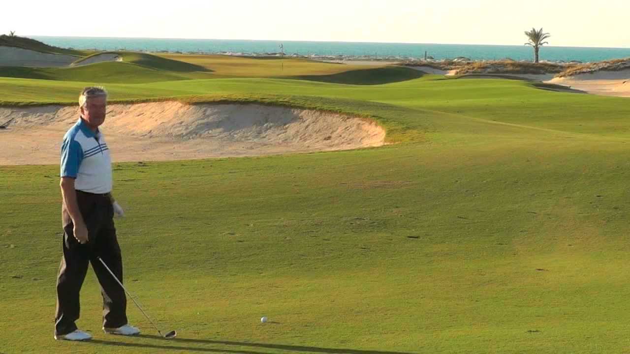 How to strike your long irons in golf - YouTube