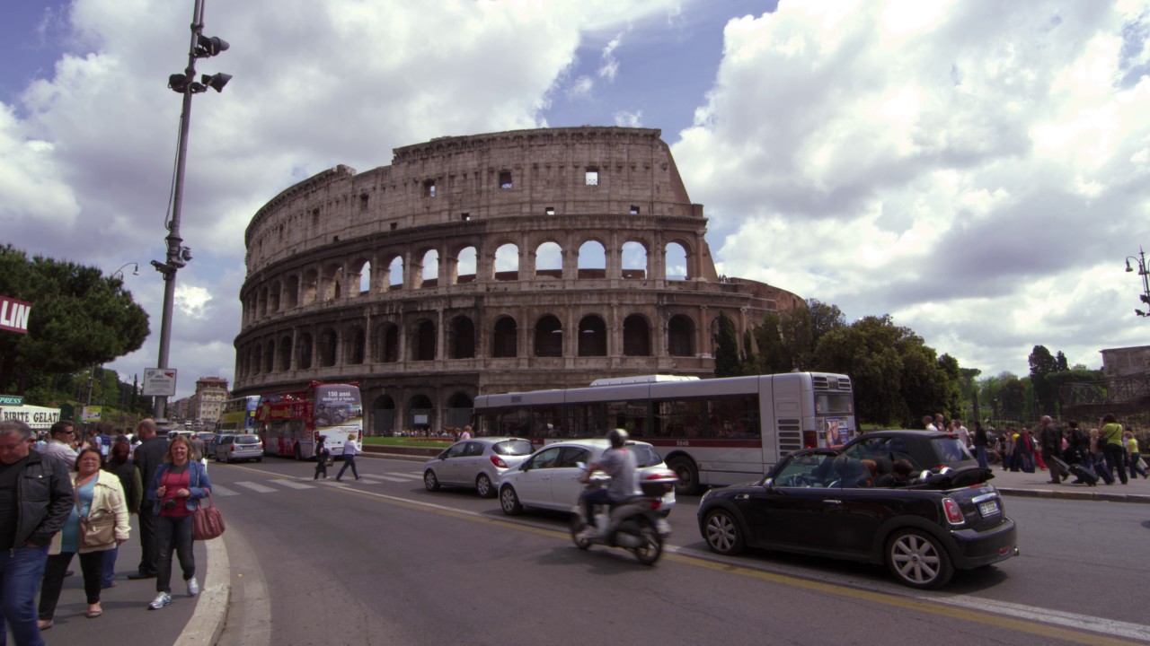 Pedestrians and Traffic in front of the Colosseum in Rome Italy - YouTube