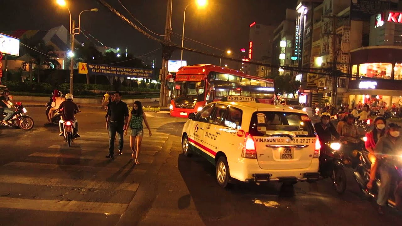 Crazy motorcycle traffic in Hochiminh City, Vietnam - YouTube
