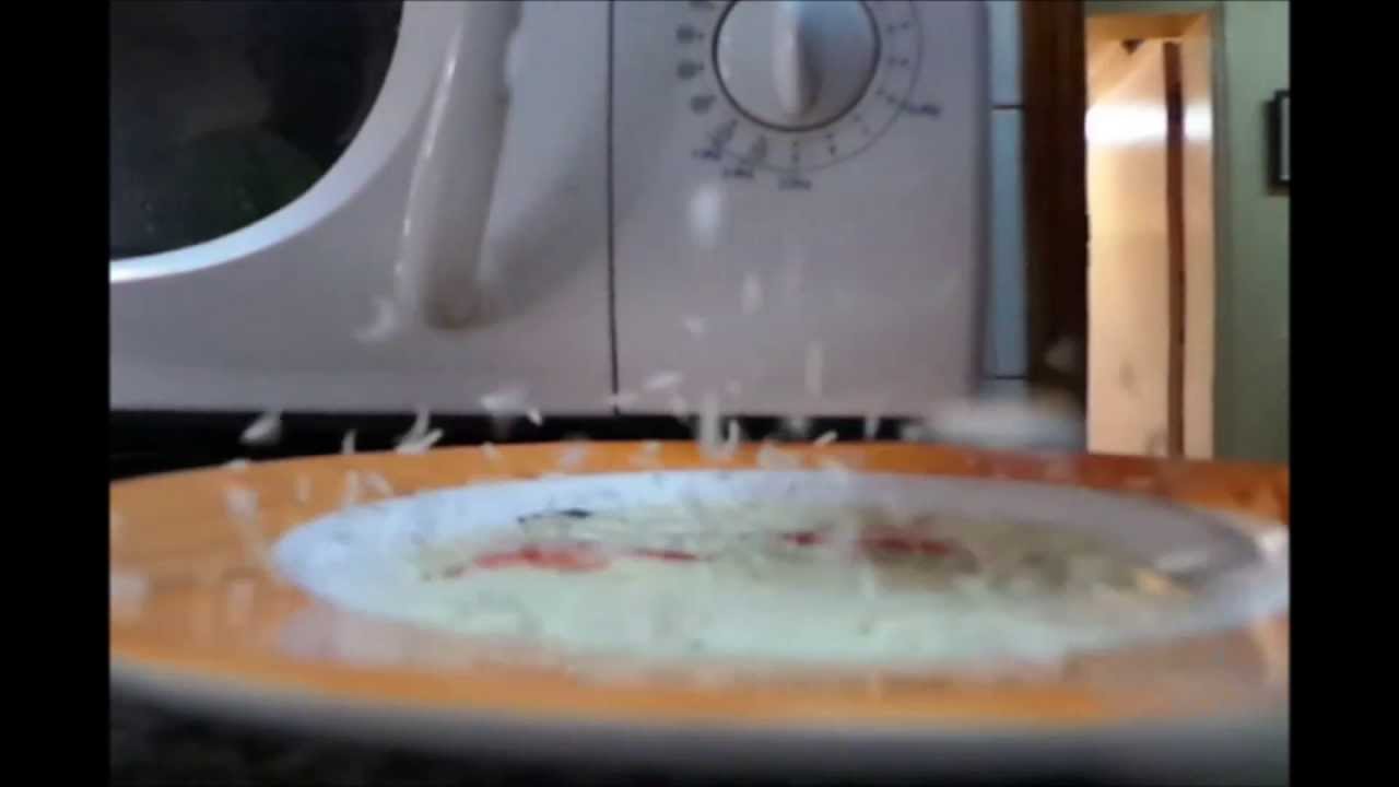 Pouring Rice on a Plate in Slow-Motion - YouTube