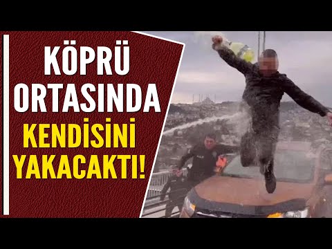ELİNDE BENZİNLE ARACININ ÜZERİNE ÇIKTI!