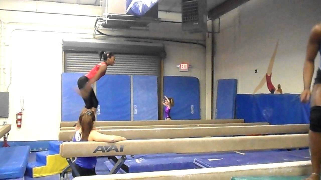 Sissone to switch side leap- Beam - YouTube