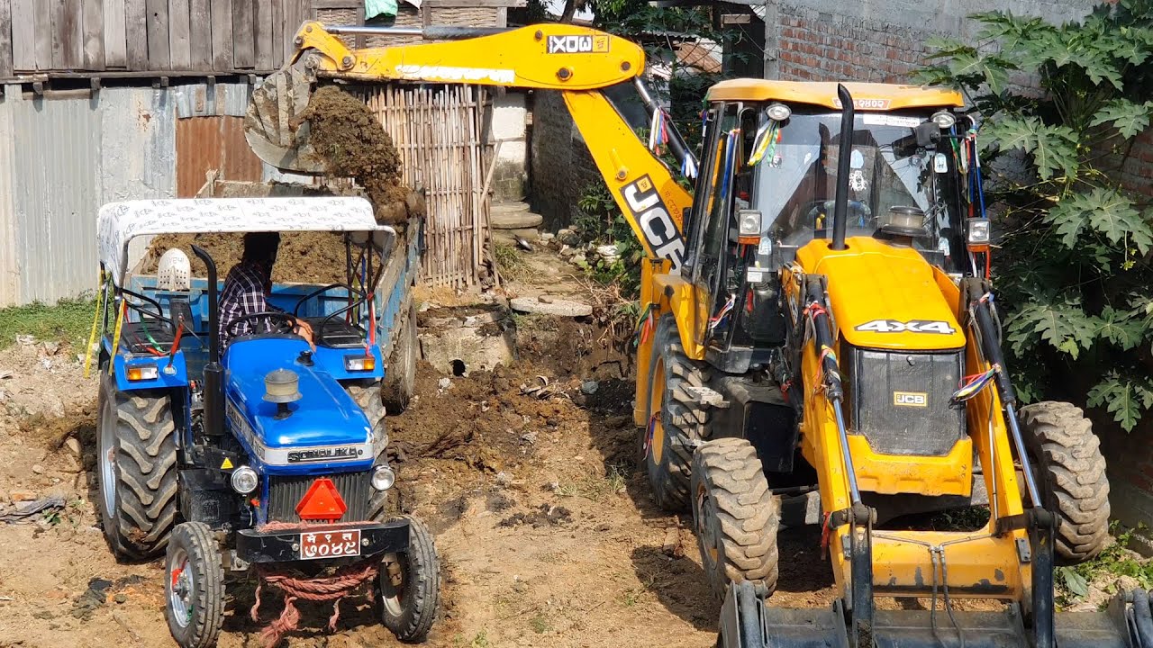 JCB Machine Loading Mud in Tractor - JCB Backhoe Digging For Home ...