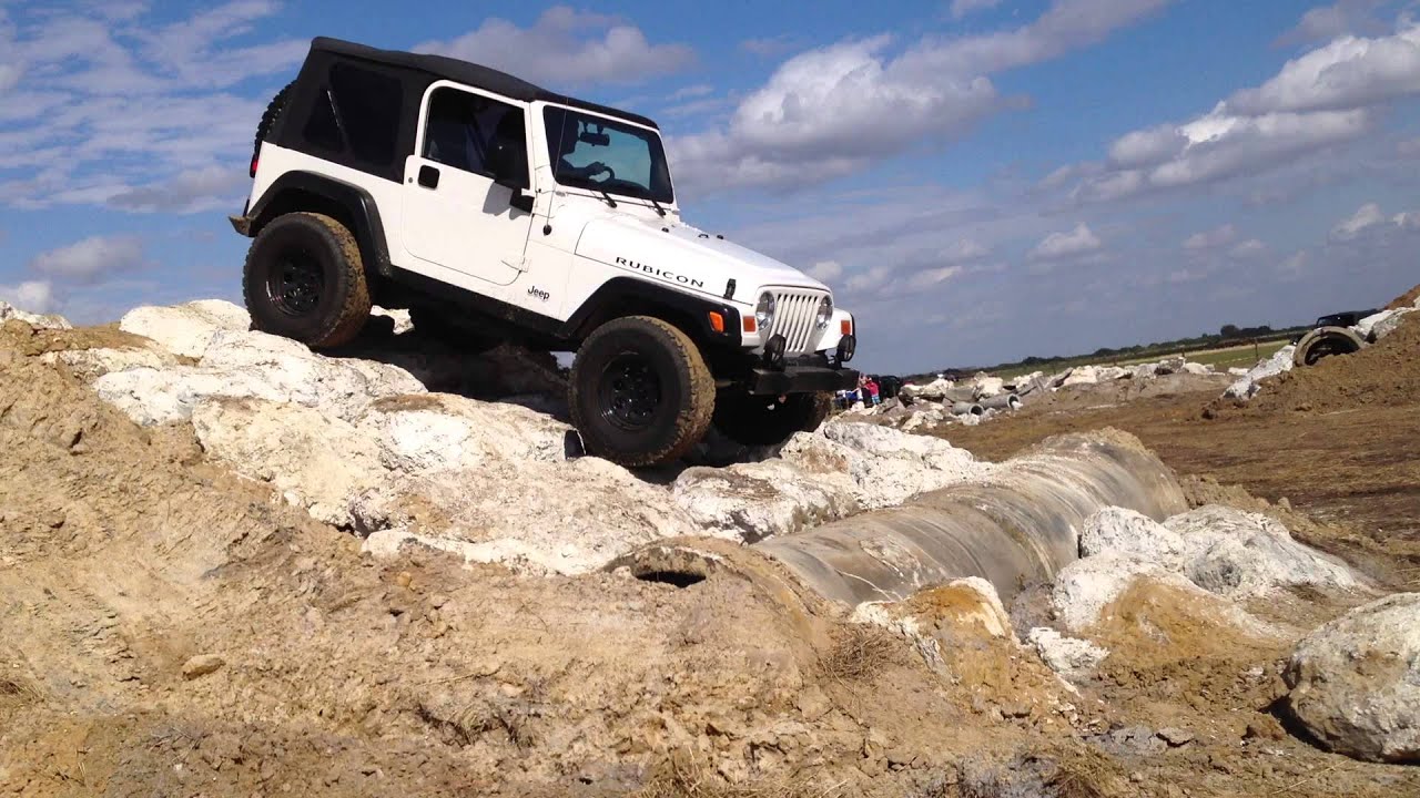 White Jeep Wrangler TJ Rubicon on the rocks - YouTube
