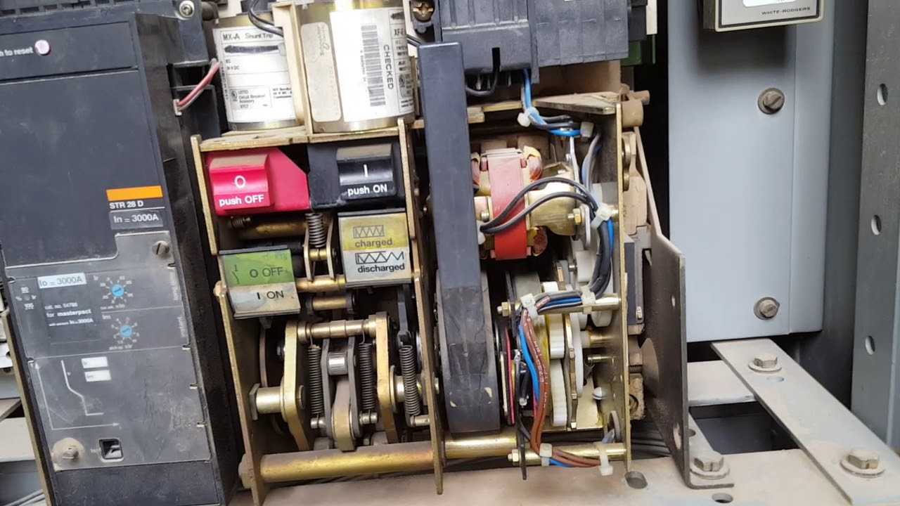 ACB motorized operating system to charge the spring. - YouTube