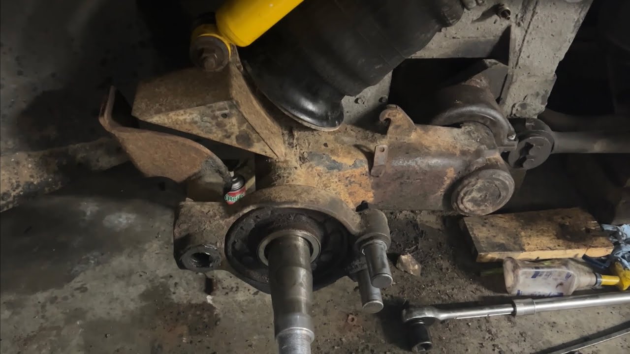 Mci bus tag axle swing arm - YouTube