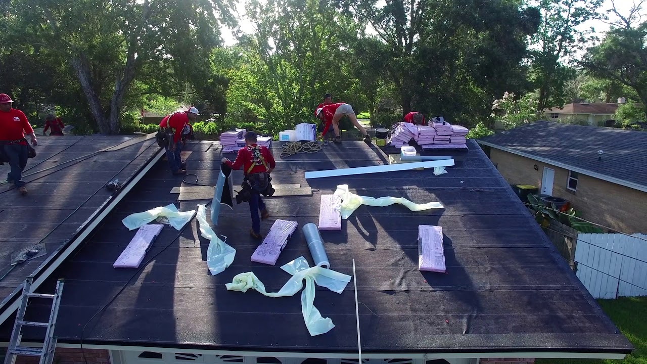 A.J. Wells Roofing Jacksonville Roof Replacement laying down Asphalt ...