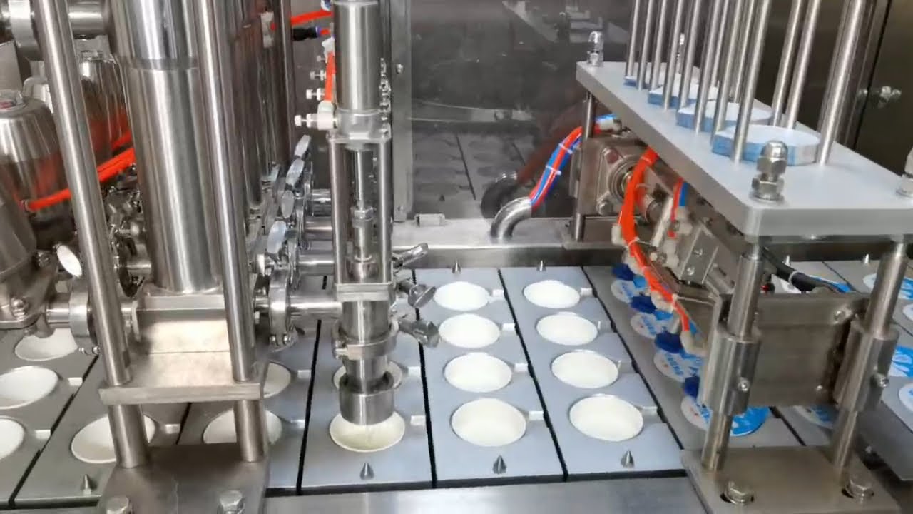 cup yogurt filling and sealing machine - YouTube