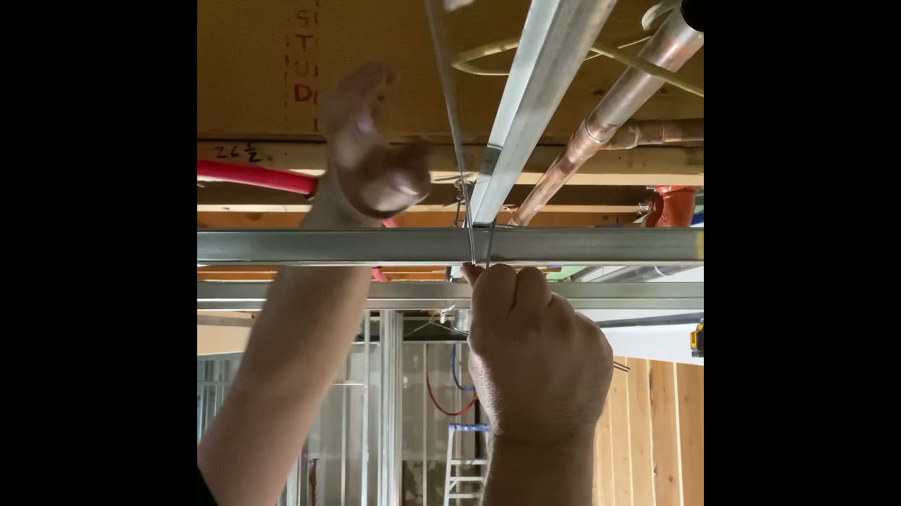 How to tie furring bar to carrying channel (drywall drop ceiling) - YouTube