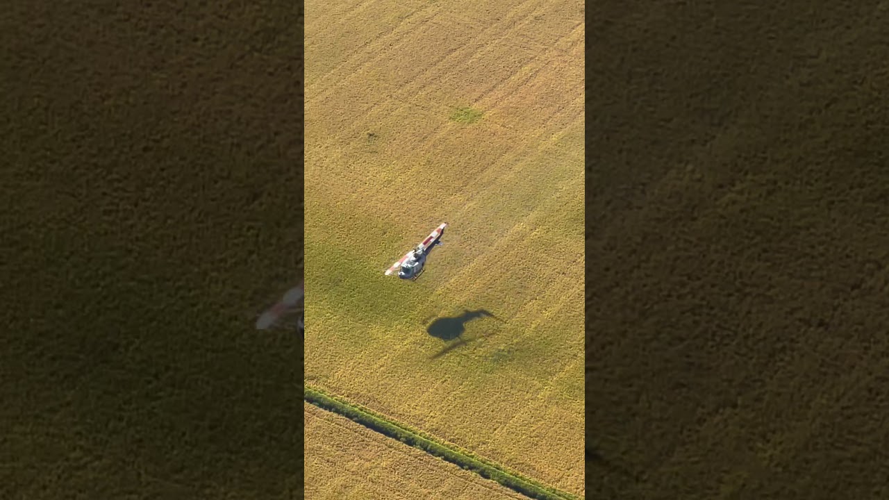 Huey helicopter spraying rice - YouTube