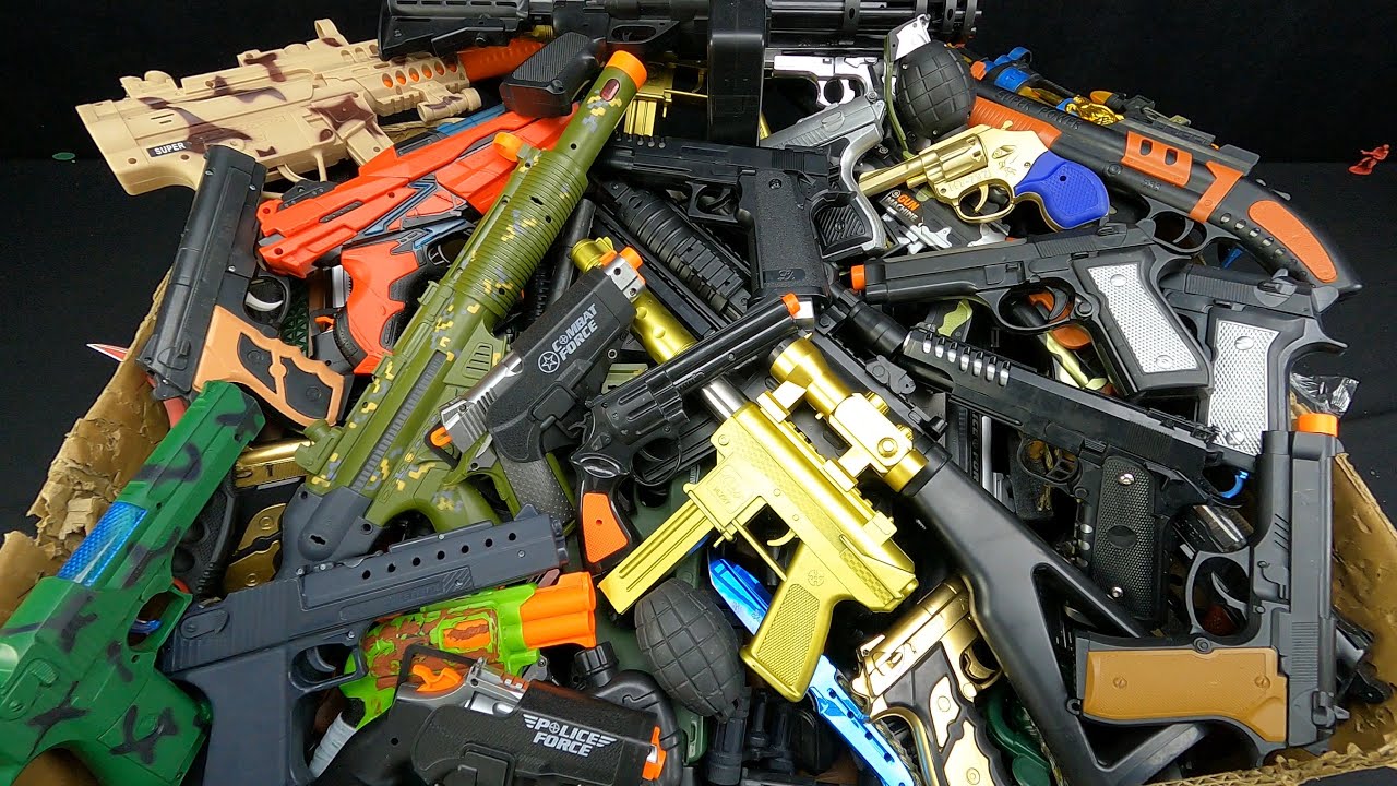 Box of Toy Guns, Real-Looking Guns, Toy Shotguns, Gold Tec-9 And ...