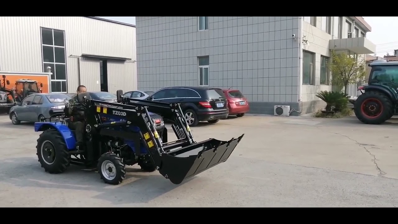 Tavol 504 with front end loader - YouTube