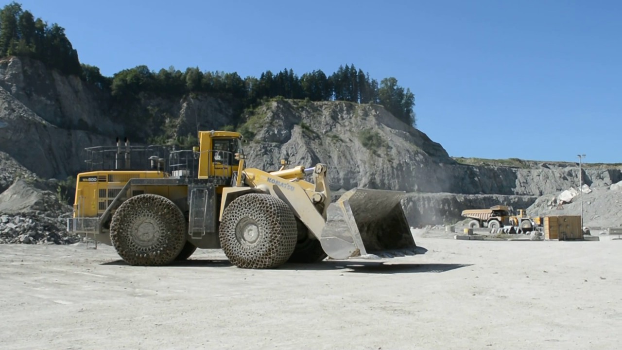 Komatsu WA800 drives by close up - YouTube